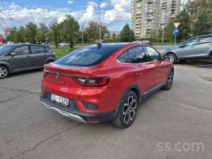 Red Renault Arkana 2021 in Riga, with an engine capacity of 1.30 L and mileage of 43 thousand km for 18990 €, photo 7 on AUTOMOTO.COM.LV
