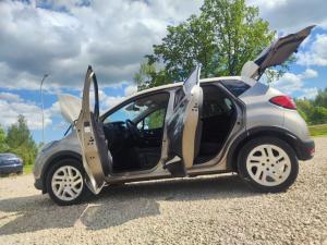 Brown Renault Captur 2014 in Riga, with an engine capacity of 1.50 L and mileage of 208 thousand km for 7990 €, photo 8 on AUTOMOTO.COM.LV