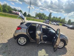Brown Renault Captur 2014 in Riga, with an engine capacity of 1.50 L and mileage of 208 thousand km for 7990 €, photo 17 on AUTOMOTO.COM.LV