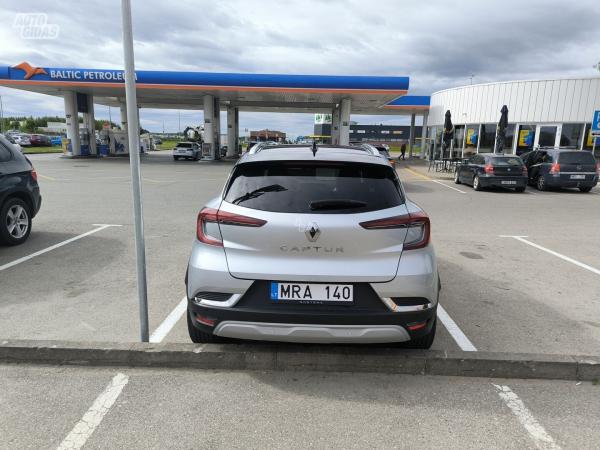 Grey Renault Captur 2023 in Vilnius, with an engine capacity of 1.00 L and mileage of 87 thousand km for 15499 €, photo 4 on AUTOMOTO.COM.LV