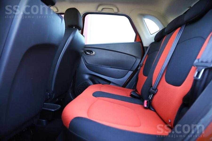 Orange Renault Captur 2013 in Riga, with an engine capacity of 1.20 L and mileage of 178 thousand km for 6495 €, photo 15 on AUTOMOTO.COM.LV
