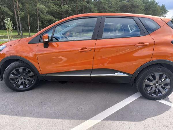 Orange Renault Captur 2013 in Utena, with an engine capacity of 0.90 L and mileage of 195 thousand km for 4650 €, photo 7 on AUTOMOTO.COM.LV