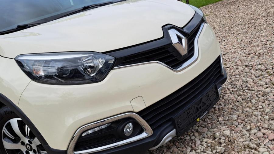 White Renault Captur 2014 in Riga, with an engine capacity of 1.50 L and mileage of 190 thousand km for 7990 €, photo 14 on AUTOMOTO.COM.LV