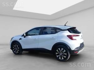 White Renault Captur 2022 in Riga, with an engine capacity of 1.60 L and mileage of 153 thousand km for 12990 €, photo 4 on AUTOMOTO.COM.LV