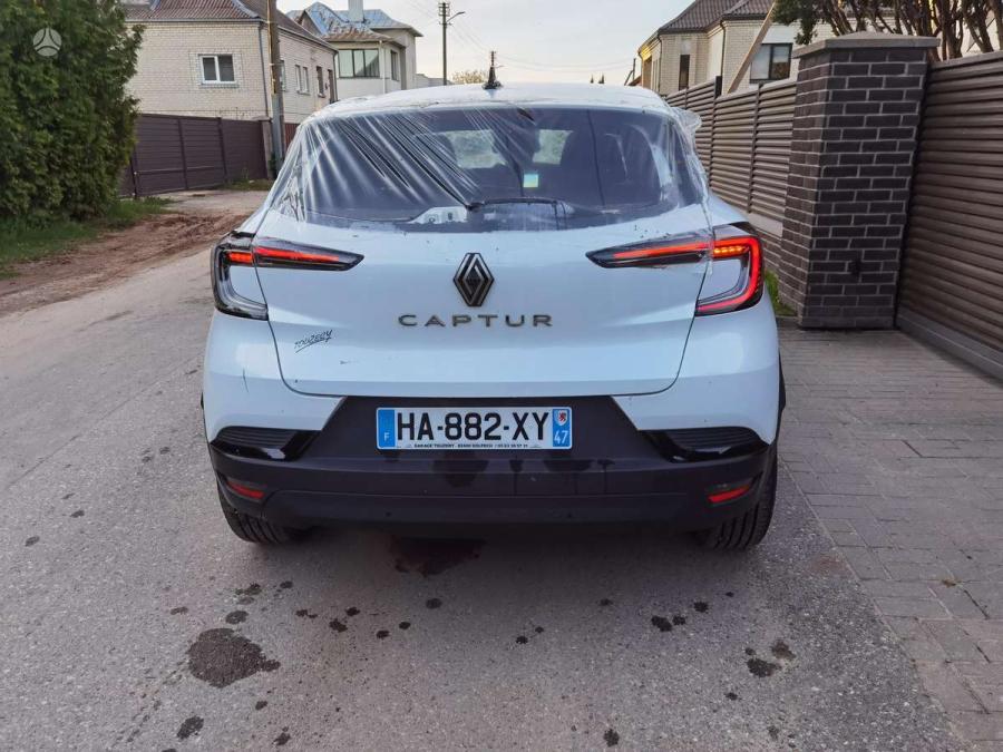 White Renault Captur 2024 in Kaunas, with an engine capacity of 1.00 L and mileage of 16 thousand km for 8200 €, photo 31 on AUTOMOTO.COM.LV