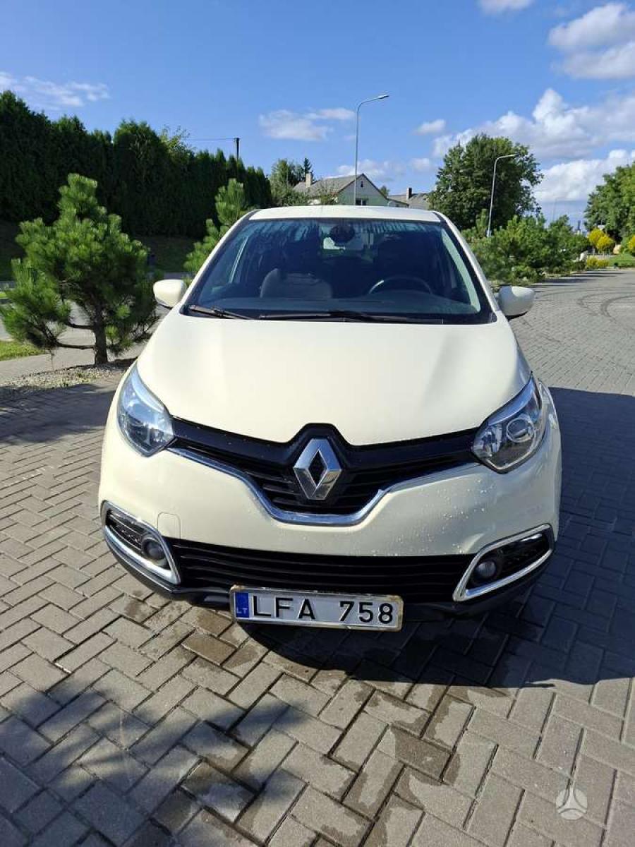 White Renault Captur 2013 in Plunge, with an engine capacity of 1.20 L and mileage of 81 thousand km for 6500 €, photo 3 on AUTOMOTO.COM.LV
