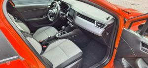 Orange Renault Clio 2024 in Kaunas, with an engine capacity of 1.60 L and mileage of 111 thousand km for 11500 €, photo 9 on AUTOMOTO.COM.LV