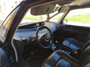 Grey Renault grand-espace 2013 in Daugavpils, with an engine capacity of 2.00 L and mileage of 205 thousand km for 6550 €, photo 29 on AUTOMOTO.COM.LV