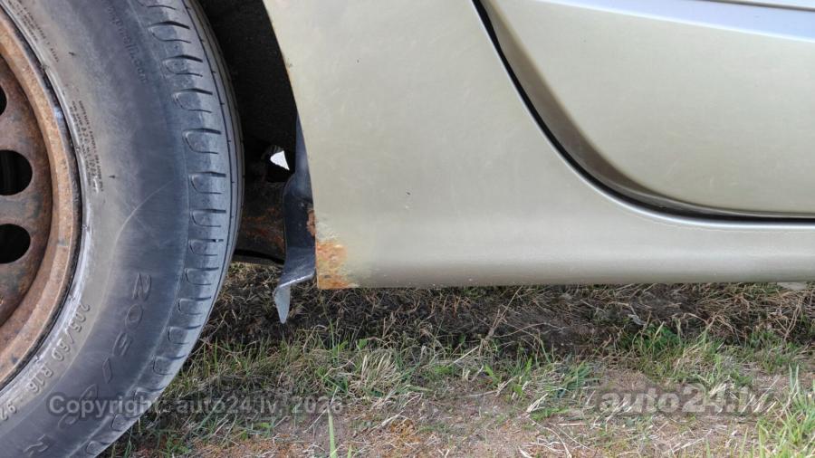 Smilšu krāsa Renault Grand Scenic 2011 Tartu, ar dzinēja tilpumu 1.60 L un nobraukumu 250 tūkst. km par 4790 €, foto 15 vietnē AUTOMOTO.COM.LV