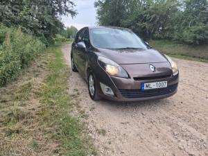 Brown Renault Grand Scenic 2011 in Riga, with an engine capacity of 1.50 L and mileage of 240 thousand km for 4690 €, photo 3 on AUTOMOTO.COM.LV