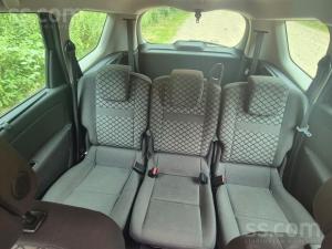 Brown Renault Grand Scenic 2011 in Riga, with an engine capacity of 1.50 L and mileage of 240 thousand km for 4690 €, photo 7 on AUTOMOTO.COM.LV