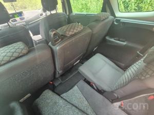 Brown Renault Grand Scenic 2011 in Riga, with an engine capacity of 1.50 L and mileage of 240 thousand km for 4690 €, photo 17 on AUTOMOTO.COM.LV