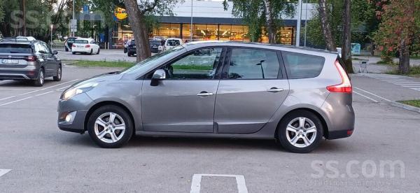 Grey Renault Grand Scenic 2009 in Riga, with an engine capacity of 1.40 L and mileage of 209 thousand km for 3200 €, photo 4 on AUTOMOTO.COM.LV