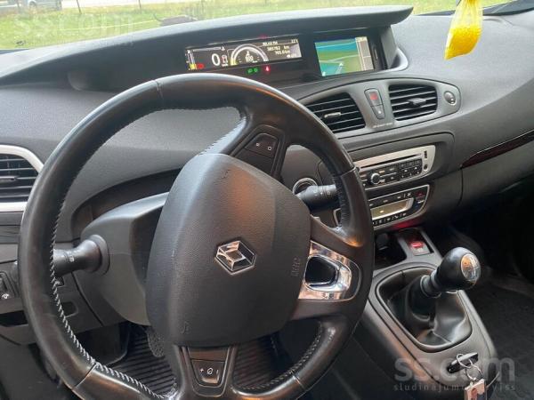 Grey Renault Grand Scenic 2013 in Riga, with an engine capacity of 1.50 L and mileage of 385 thousand km for 3500 €, photo 7 on AUTOMOTO.COM.LV