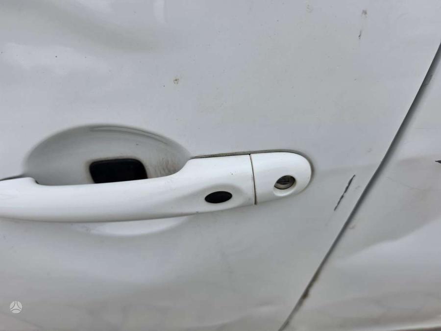 White Renault Grand Scenic 2015 in Taurage, with an engine capacity of 1.46 L and mileage of 235 thousand km for 4200 €, photo 9 on AUTOMOTO.COM.LV