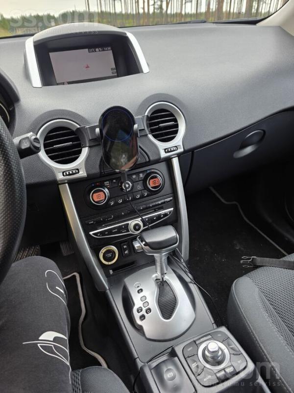 Grey Renault Koleos 2009 in Riga, with an engine capacity of 2.00 L and mileage of 210 thousand km for 3700 €, photo 6 on AUTOMOTO.COM.LV