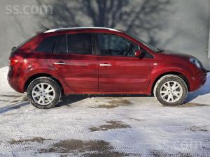 Red Renault Koleos 2008 in Ogre, with an engine capacity of 2.00 L and mileage of 257 thousand km for 3750 €, photo 3 on AUTOMOTO.COM.LV