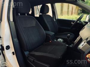White Renault Koleos 2012 in Cesis, with an engine capacity of 2.00 L and mileage of 0 thousand km for 5990 €, photo 13 on AUTOMOTO.COM.LV