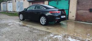Black Renault Laguna 2009 in Siauliai, with an engine capacity of 2.00 L and mileage of 300 thousand km for 2450 €, photo 4 on AUTOMOTO.COM.LV