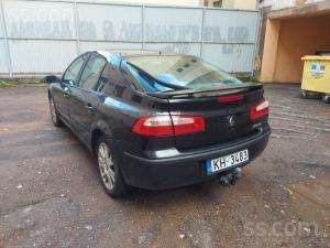 Black Renault Laguna 2003 in Riga, with an engine capacity of 1.80 L and mileage of 214 thousand km for 500 €, photo 7 on AUTOMOTO.COM.LV