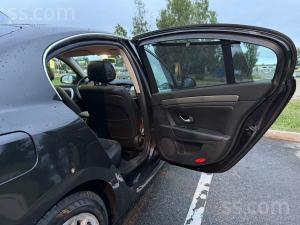 Black Renault Laguna 2007 in Riga, with an engine capacity of 2.00 L and mileage of 263 thousand km for 2000 €, photo 12 on AUTOMOTO.COM.LV