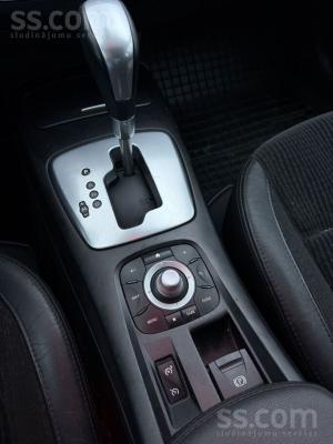 Black Renault Laguna 2007 in Riga, with an engine capacity of 2.00 L and mileage of 263 thousand km for 2000 €, photo 15 on AUTOMOTO.COM.LV