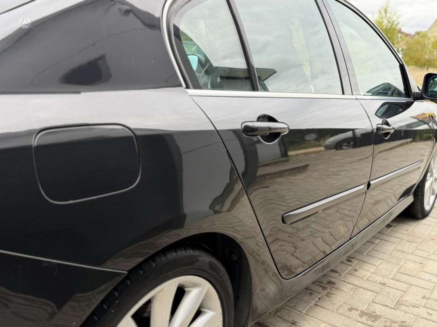 Melns Renault Laguna 2007 Viļņa, ar dzinēja tilpumu 2.00 L un nobraukumu 207 tūkst. km par 1750 €, foto 11 vietnē AUTOMOTO.COM.LV