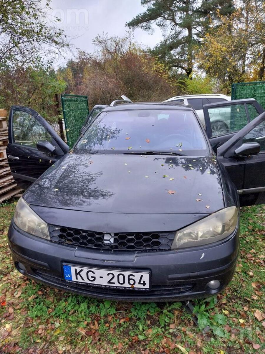 Melns Renault Laguna 2005 Rīga, ar dzinēja tilpumu 2.20 L un nobraukumu 241 tūkst. km par 300 €, foto 1 vietnē AUTOMOTO.COM.LV