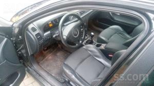 Black Renault Laguna 2006 in Riga, with an engine capacity of 2.20 L and mileage of 288 thousand km for 1650 €, photo 11 on AUTOMOTO.COM.LV