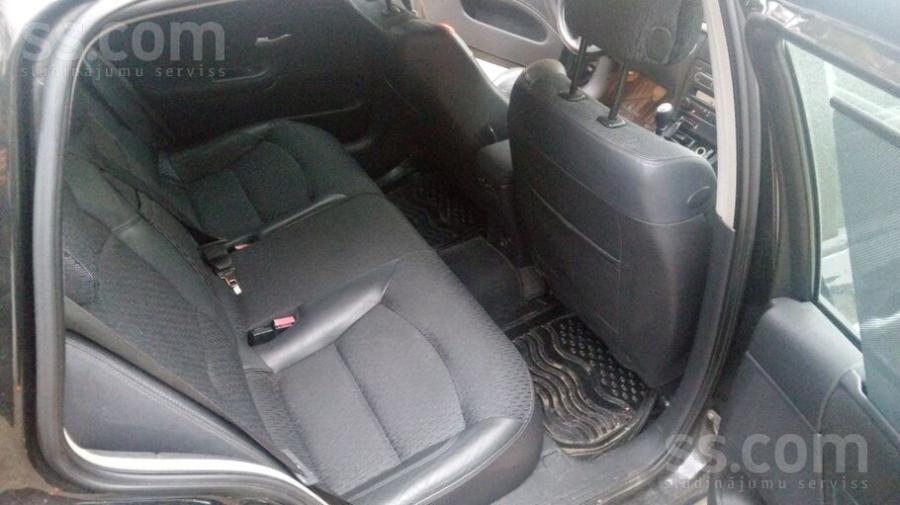 Black Renault Laguna 2006 in Riga, with an engine capacity of 2.20 L and mileage of 288 thousand km for 1650 €, photo 12 on AUTOMOTO.COM.LV