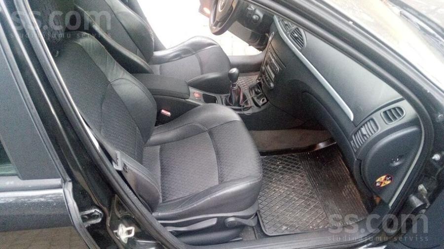 Black Renault Laguna 2006 in Riga, with an engine capacity of 2.20 L and mileage of 288 thousand km for 1650 €, photo 13 on AUTOMOTO.COM.LV