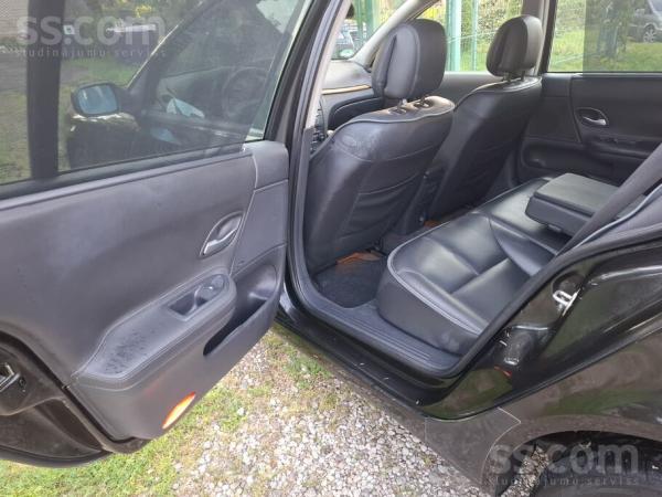 Black Renault Laguna 2006 in Daugavpils, with an engine capacity of 2.20 L and mileage of 290 thousand km for 1200 €, photo 10 on AUTOMOTO.COM.LV