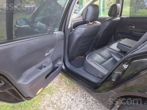 Black Renault Laguna 2006 in Daugavpils, with an engine capacity of 2.20 L and mileage of 290 thousand km for 1200 €, photo 11 on AUTOMOTO.COM.LV