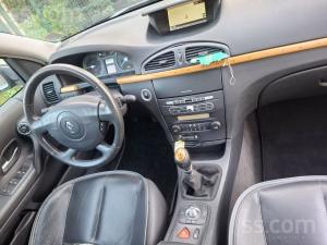 Black Renault Laguna 2006 in Daugavpils, with an engine capacity of 2.20 L and mileage of 290 thousand km for 1200 €, photo 13 on AUTOMOTO.COM.LV