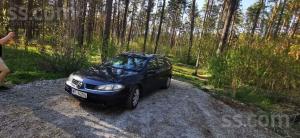 Black Renault Laguna 2007 in Riga, with an engine capacity of 1.90 L and mileage of 374 thousand km for 1400 €, photo 3 on AUTOMOTO.COM.LV