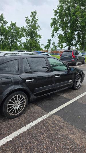 Black Renault Laguna 2007 in Tallinn, with an engine capacity of 2.20 L and mileage of 250 thousand km for 1299 €, photo 5 on AUTOMOTO.COM.LV