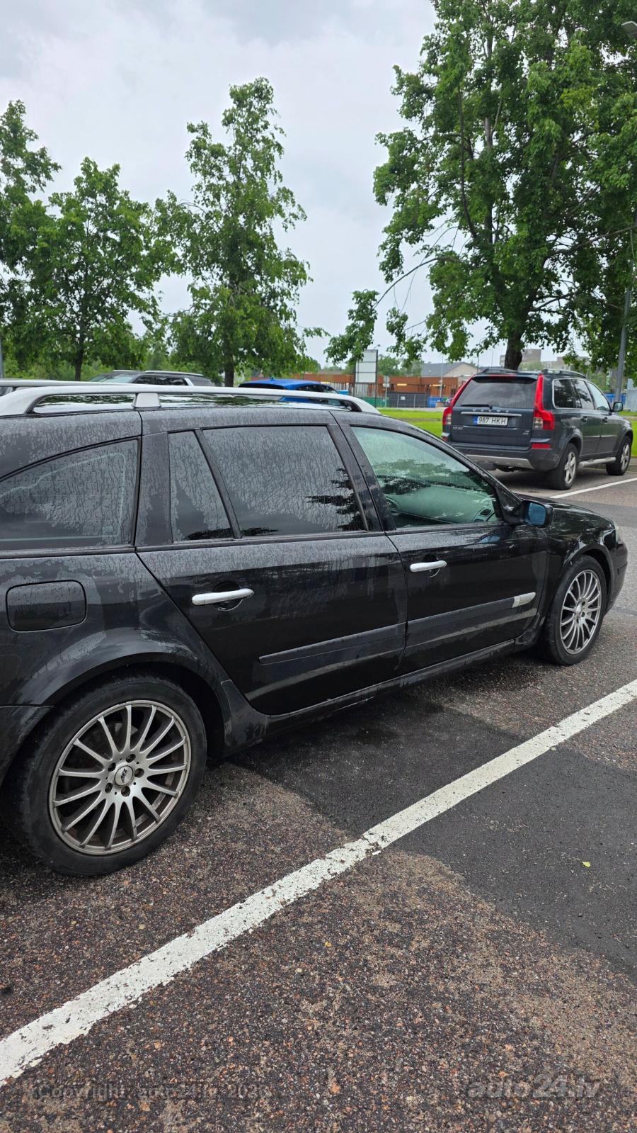 Black Renault Laguna 2007 in Tallinn, with an engine capacity of 2.20 L and mileage of 250 thousand km for 1299 €, photo 5 on AUTOMOTO.COM.LV