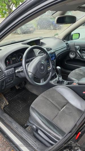Black Renault Laguna 2007 in Tallinn, with an engine capacity of 2.20 L and mileage of 250 thousand km for 1299 €, photo 12 on AUTOMOTO.COM.LV