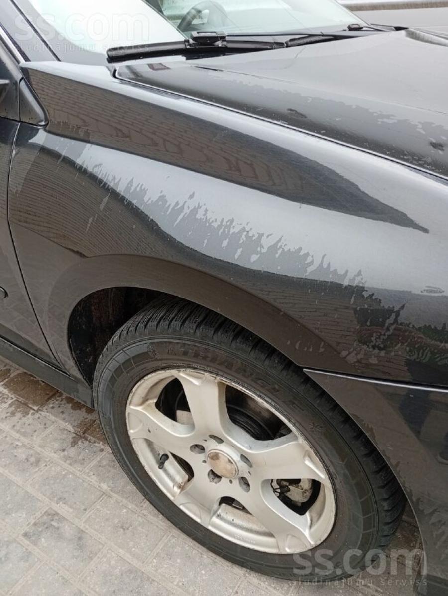 Black Renault Laguna 2008 in Ogre, with an engine capacity of 2.00 L and mileage of 388 thousand km for 1750 €, photo 1 on AUTOMOTO.COM.LV