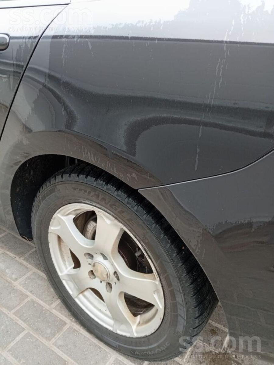 Melns Renault Laguna 2008 Ogre, ar dzinēja tilpumu 2.00 L un nobraukumu 372 tūkst. km par 1250 €, foto 5 vietnē AUTOMOTO.COM.LV