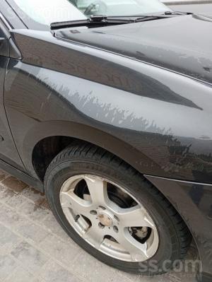 Melns Renault Laguna 2008 Ogre, ar dzinēja tilpumu 2.00 L un nobraukumu 372 tūkst. km par 1250 €, foto 6 vietnē AUTOMOTO.COM.LV