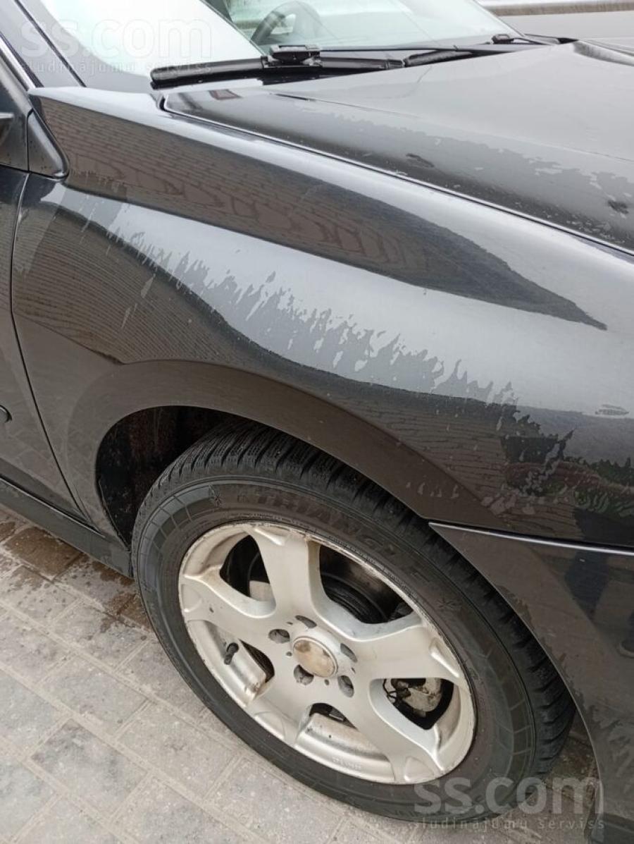 Melns Renault Laguna 2008 Ogre, ar dzinēja tilpumu 2.00 L un nobraukumu 372 tūkst. km par 1250 €, foto 6 vietnē AUTOMOTO.COM.LV