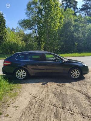 Melns Renault Laguna 2009 Viļņa, ar dzinēja tilpumu 2.00 L un nobraukumu 271 tūkst. km par 2400 €, foto 7 vietnē AUTOMOTO.COM.LV