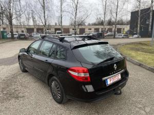 Black Renault Laguna 2010 in Marijampole, with an engine capacity of 1.46 L and mileage of 292 thousand km for 2199 €, photo 5 on AUTOMOTO.COM.LV