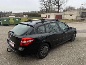 Black Renault Laguna 2010 in Marijampole, with an engine capacity of 1.46 L and mileage of 292 thousand km for 2199 €, photo 8 on AUTOMOTO.COM.LV