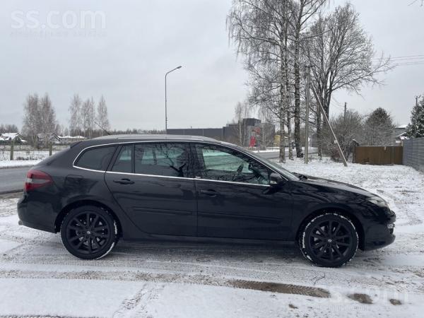 Black Renault Laguna 2012 in Riga, with an engine capacity of 2.00 L and mileage of 273 thousand km for 4990 €, photo 6 on AUTOMOTO.COM.LV