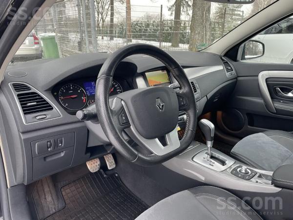 Black Renault Laguna 2012 in Riga, with an engine capacity of 2.00 L and mileage of 273 thousand km for 4990 €, photo 9 on AUTOMOTO.COM.LV