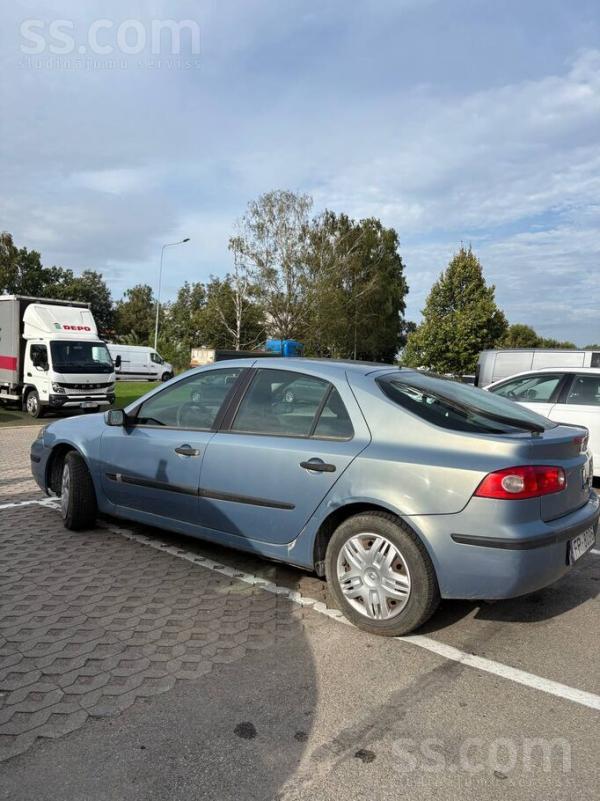 Рено Лагуна 2005 в Рига на AUTOMOTO.COM.LV Синий Рено Лагуна 2005 в Рига, объемом двигателя 2.00 л и пробегом 178 тыс. км за 1000 €, фото 5 на AUTOMOTO.COM.LV