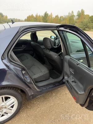 Zils Renault Laguna 2005 Rīga, ar dzinēja tilpumu 1.90 L un nobraukumu 385 tūkst. km par 1000 €, foto 8 vietnē AUTOMOTO.COM.LV