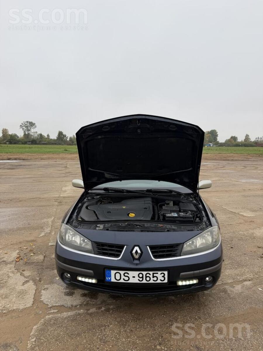 Zils Renault Laguna 2005 Rīga, ar dzinēja tilpumu 1.90 L un nobraukumu 385 tūkst. km par 1000 €, foto 14 vietnē AUTOMOTO.COM.LV